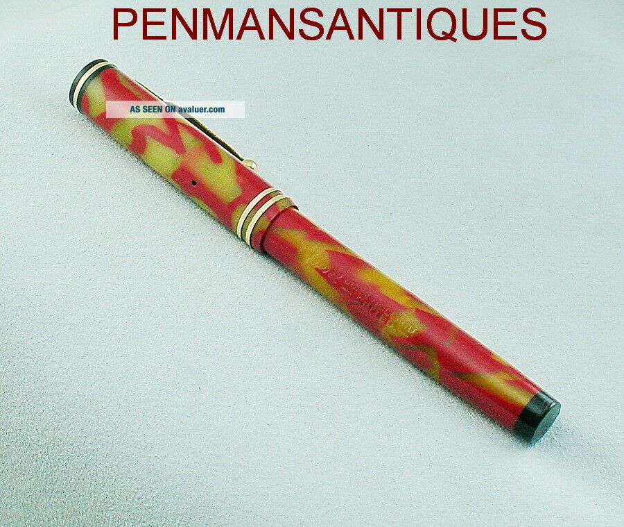 CIRCA 1929 JOHN HOLLAND FOUNTAIN PEN IN A RARE RED AND PEARL COLOR ...