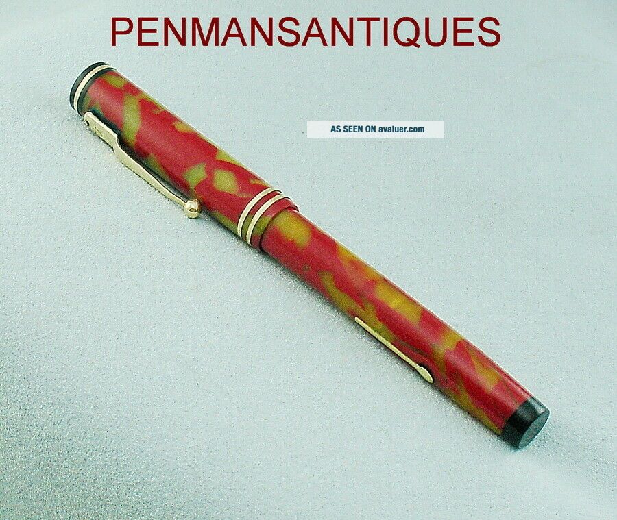CIRCA 1929 JOHN HOLLAND FOUNTAIN PEN IN A RARE RED AND PEARL COLOR ...